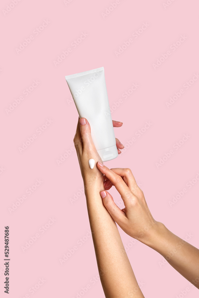 Woman applying lotion to hand. Cosmetic product branding mockup. Daily ...