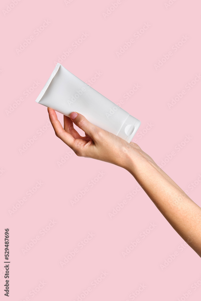 Woman hand showing cream product. Cosmetic product branding mockup ...