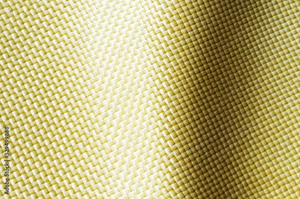 Bulletproof material aramid. Aramid kevlar background. Golden kevlar ...