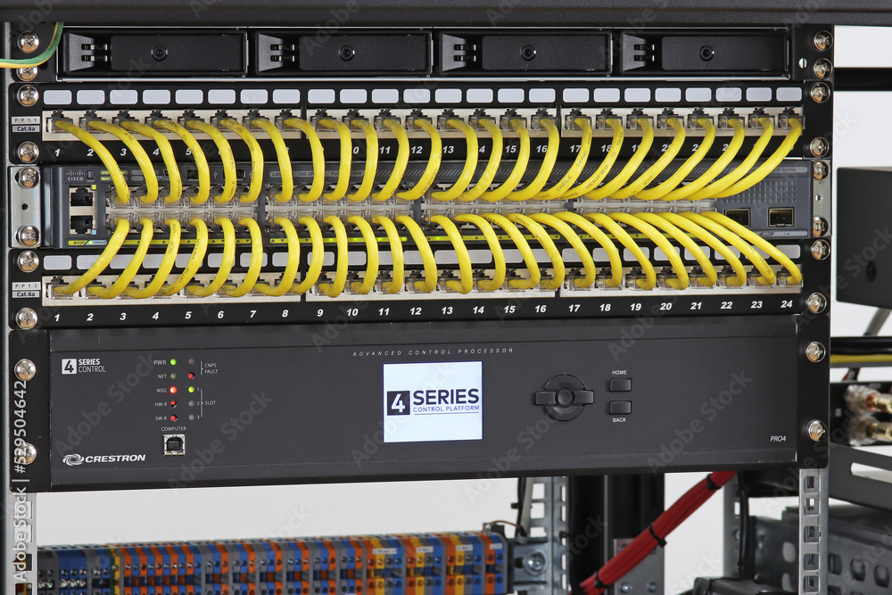 Connecting an Ethernet switch using patch cords with RJ45 connectors ...
