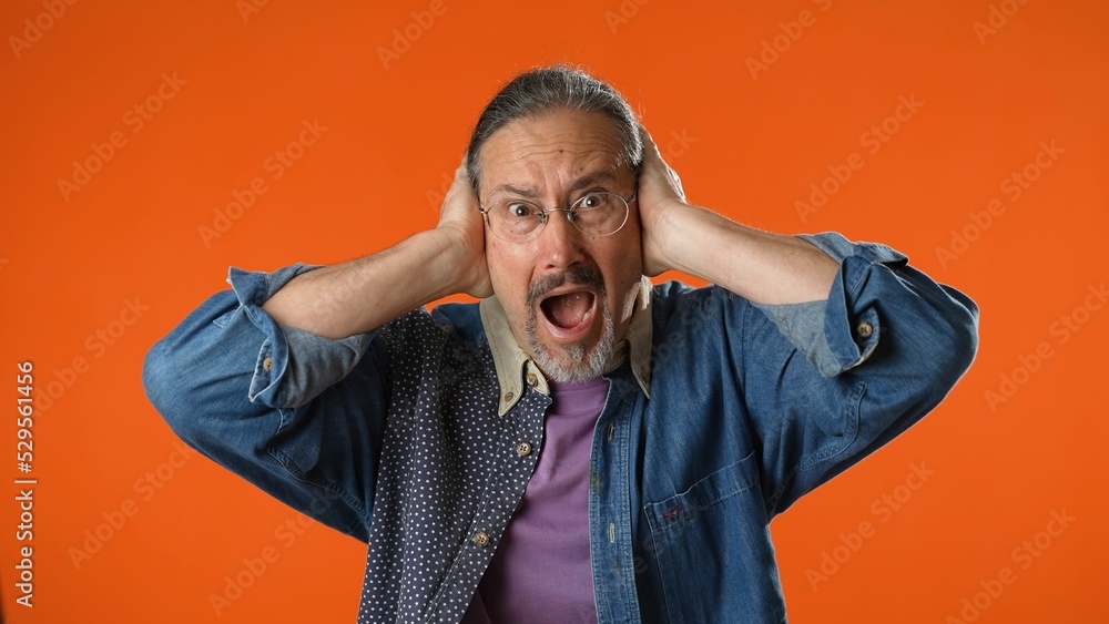 Scared shocked elderly bearded man 50s 60s look camera covering hiding ...
