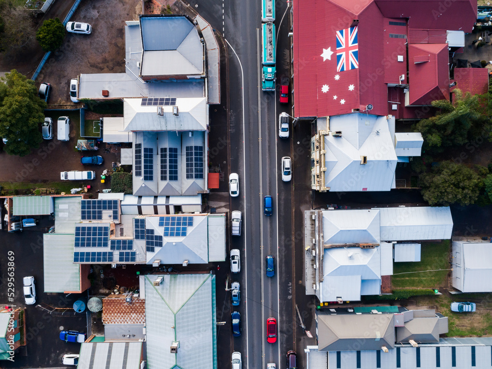 Overhead top down view of busy street and buildings in Aussie town ...
