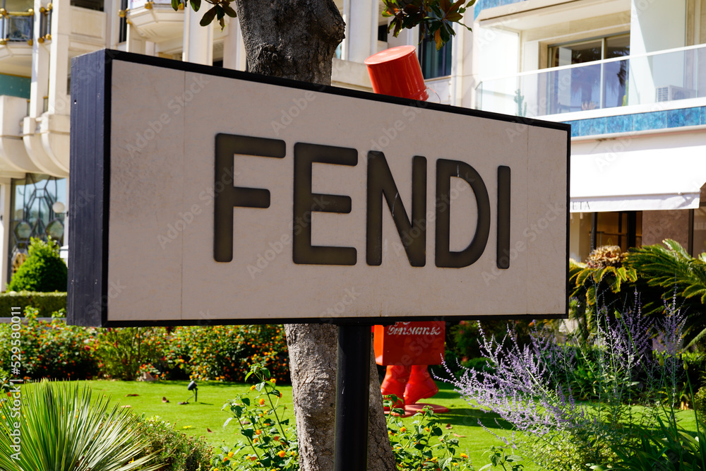 Fendi logo sign and brand text on store facade fashion clothing shop ...