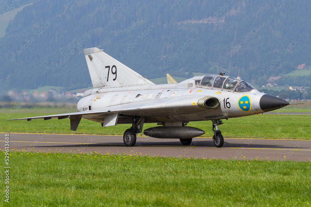 A Saab Draken military jet of the Swedish Air Force landing in Zeltweg ...