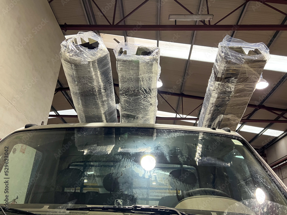 front view of packages sticking out the front of a delivery van Stock ...