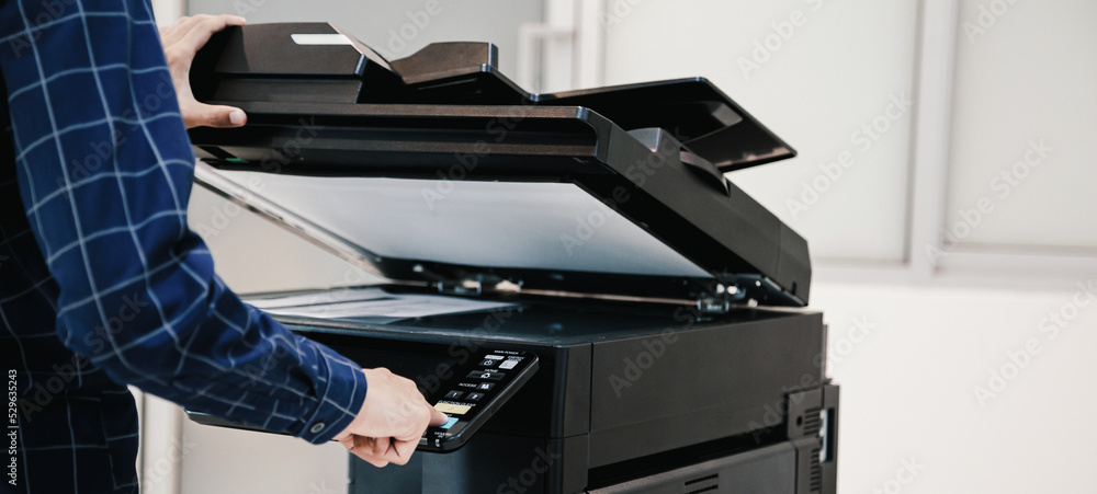 Copier printer, Close up hand office man press copy button on panel to ...