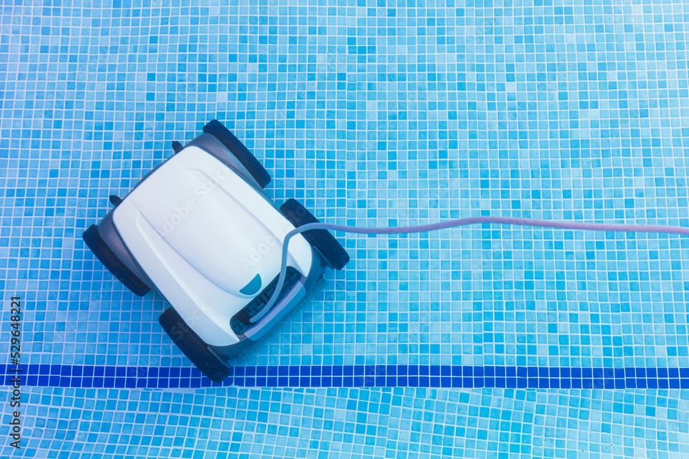 Underwater pool vacuum cleaner. Robotic cleaning of the pool floor ...