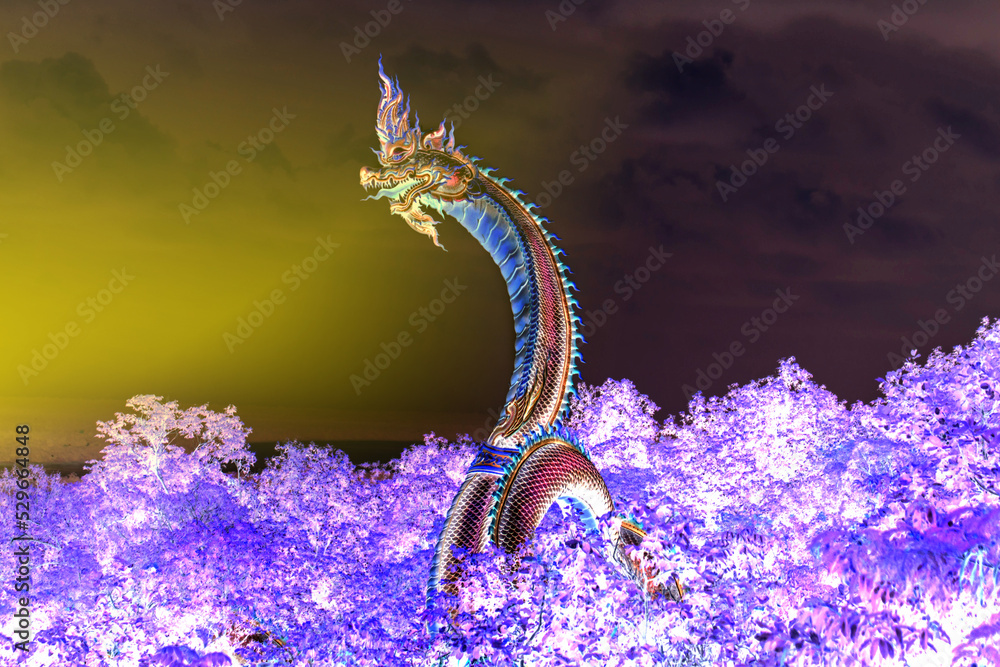 A photograph of a serpent statue on a black background. Reptiles have a ...