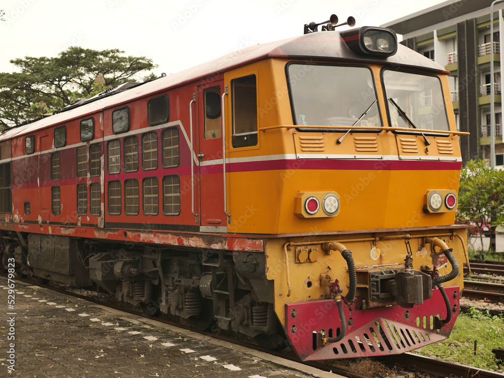 old train in the country. yellow train. diesel locomotive. The empty ...