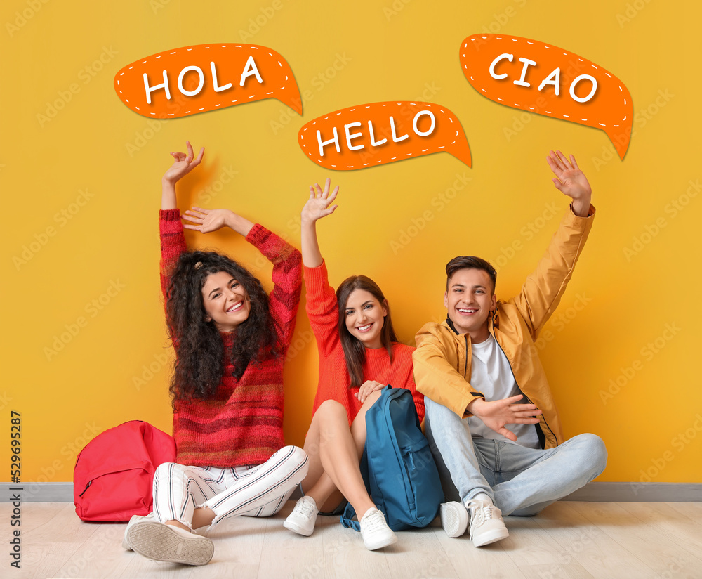 Young students and speech bubbles with words HELLO in different ...