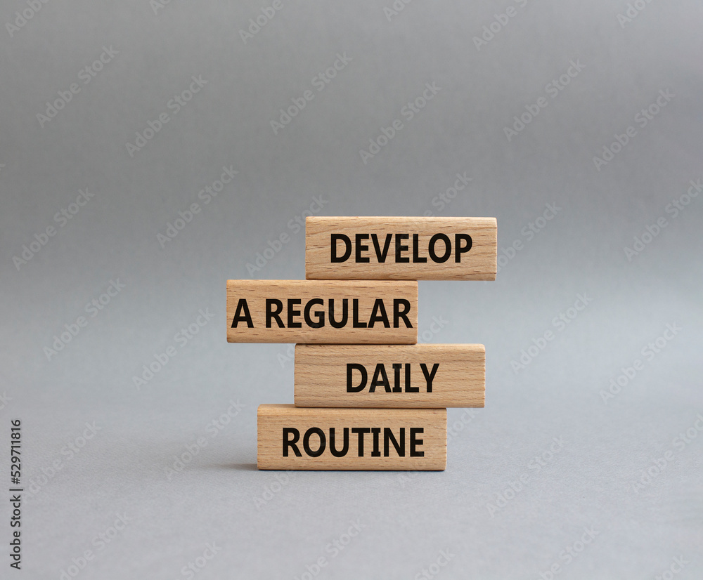 Develop a regular daily routine symbol. Concept words Develop a regular ...