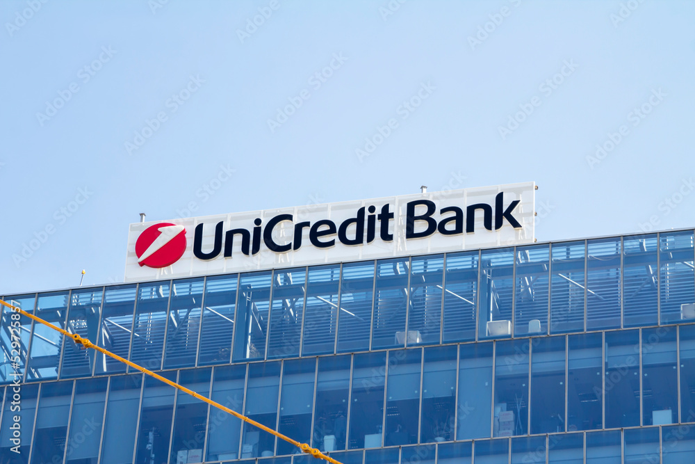 Sign logo of UniCredit Bank on the headquarters building from Bucharest ...