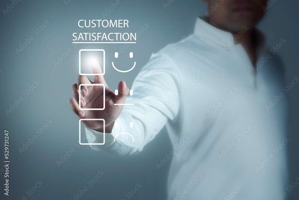 Business people are touching the virtual screen on the happy face icon ...