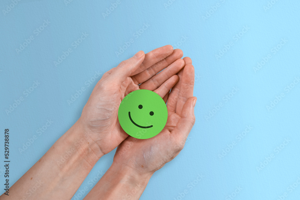Positive Green Smiley Concept - Successful Paper Smiley Face on Blue ...