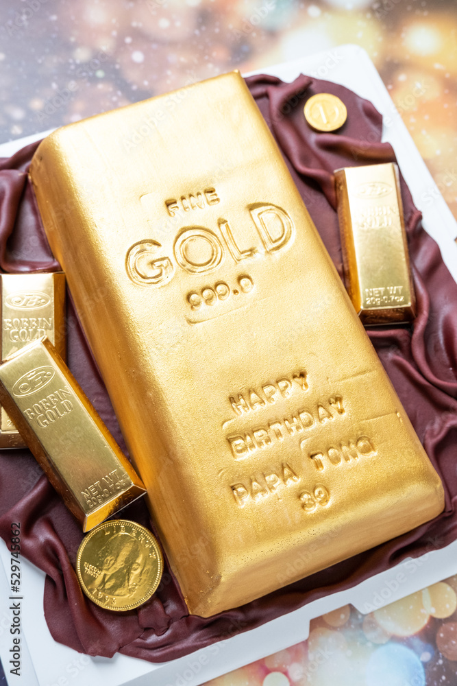 Gold bar birthday cake with white background Stock Photo | Adobe Stock