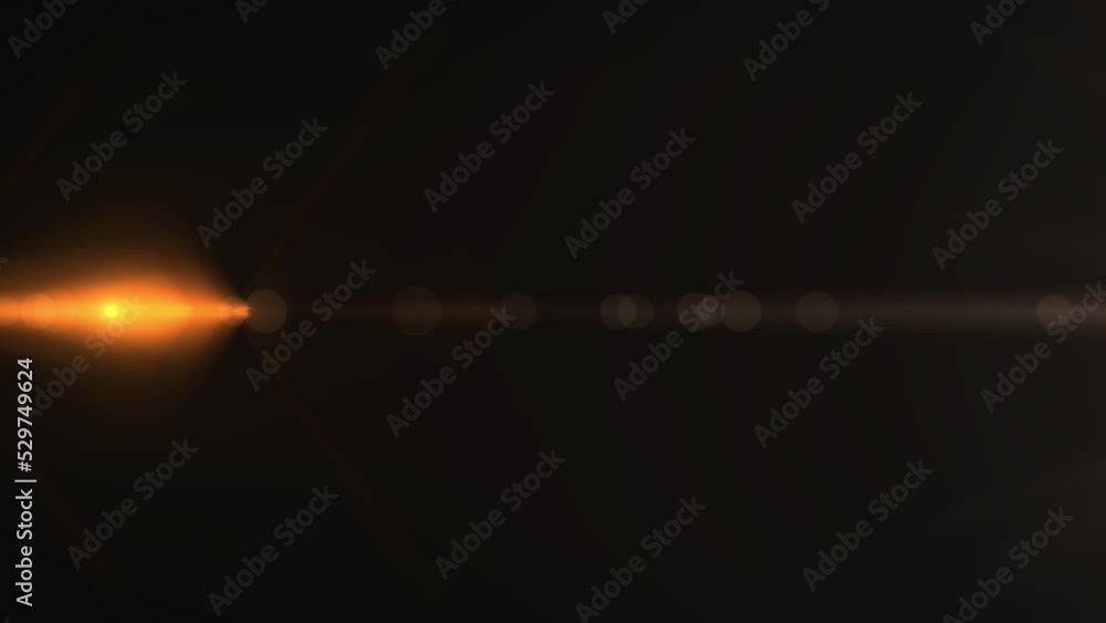 Vidéo Stock Optical Lens flare effect, 4K on black background. Top left ...