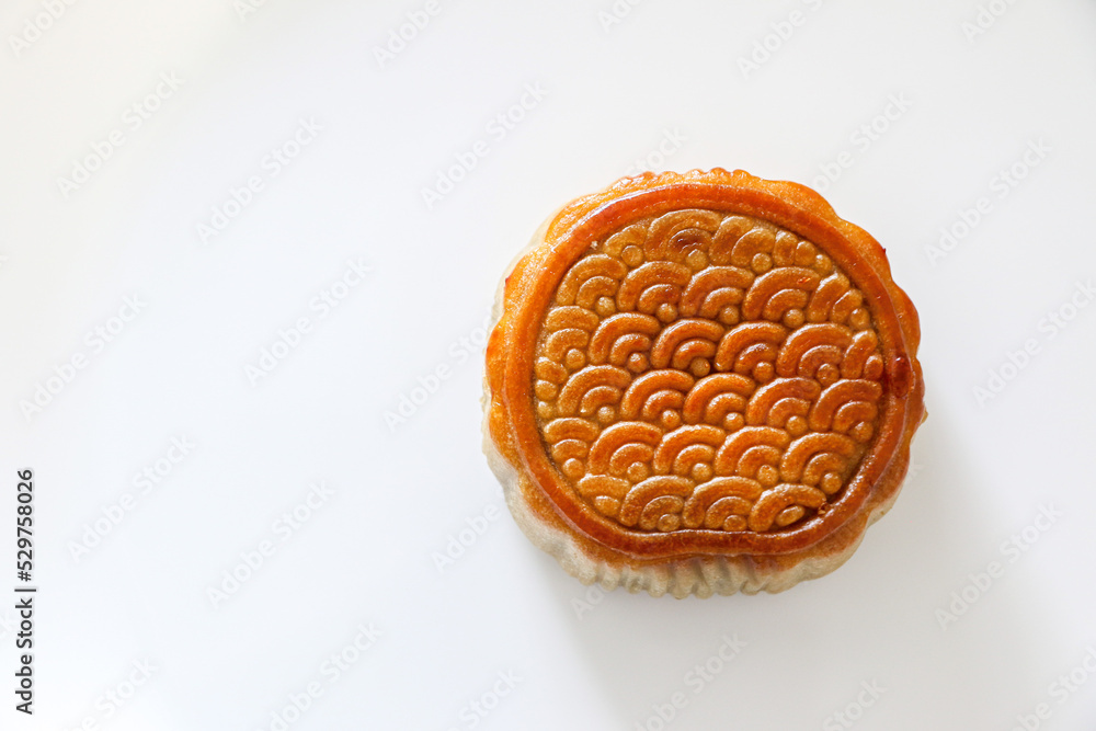 Top view of round traditional Chinese Mid-Autumn Festival mooncake with ...