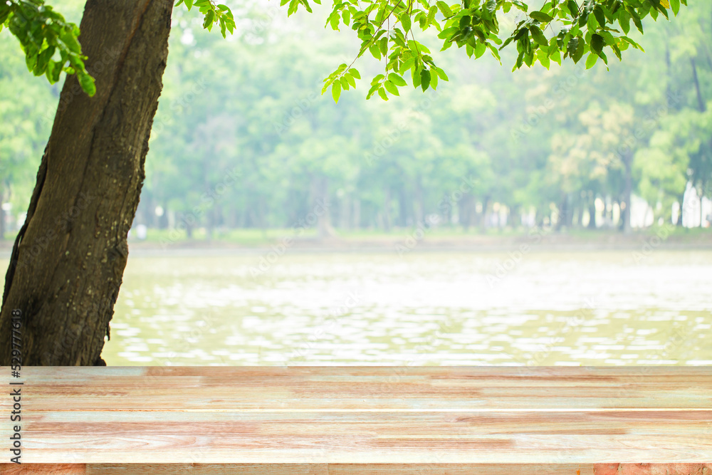 Abstract Natural wood table with Morning sun light with wind blowing ...