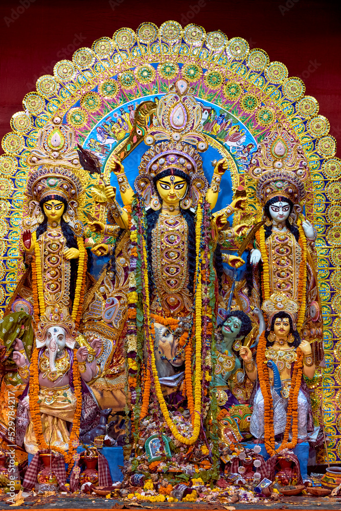 Divine idol of Hindu Goddess Durga slaying buffalo demon Mahishasura ...