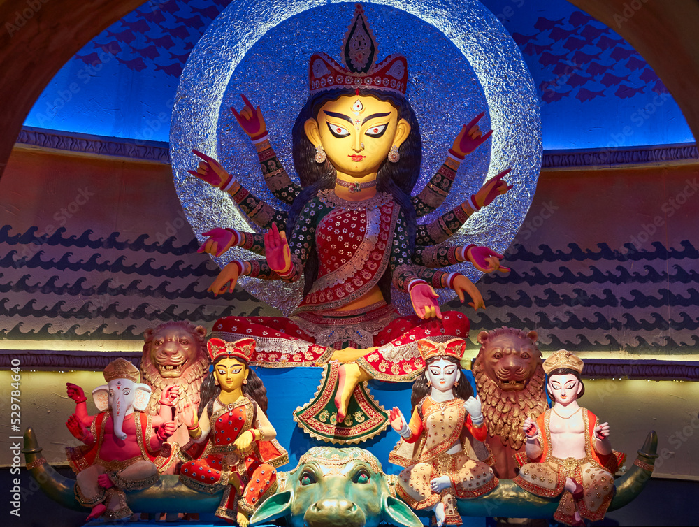Divine idol of Hindu Goddess Durga slaying buffalo demon Mahishasura ...