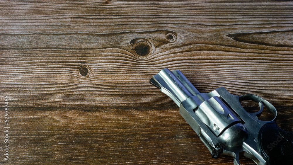 Revolver stainless steel short barrel 357 magnum on wooden brown ...