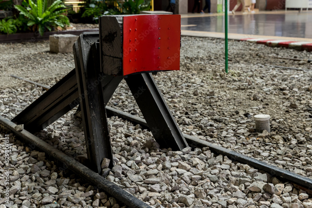 Train stopper or Train bumper installed on track for break. Train ...