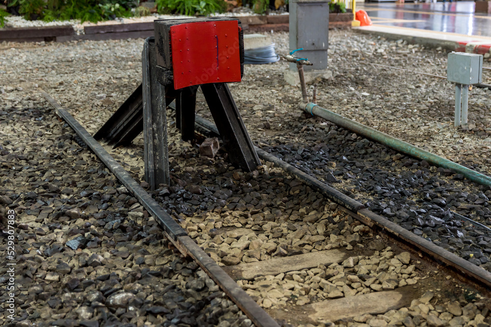 Train stopper or Train bumper installed on track for break. Train ...