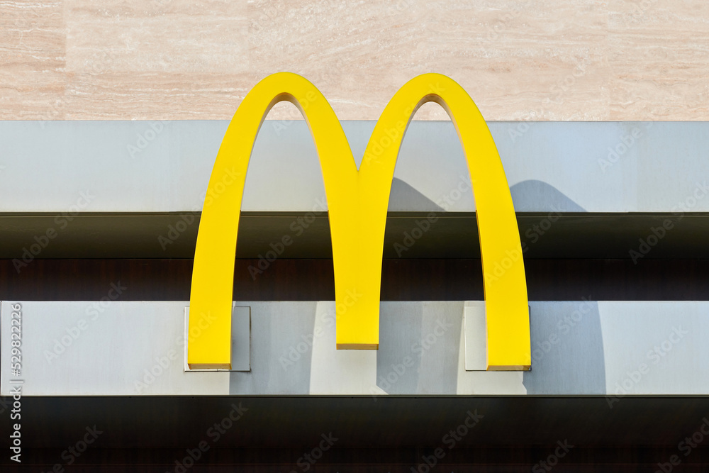 McDonalds logo on fast food restaurant branch, yellow macdonald logo of ...