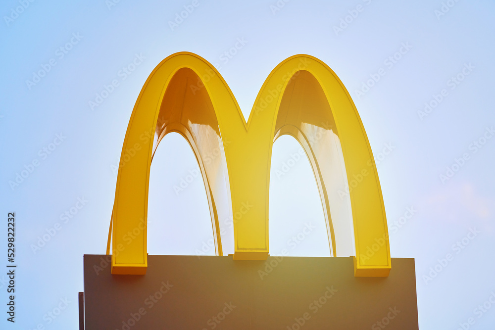 McDonalds logo roadside sign of fast food restaurant branch, yellow ...