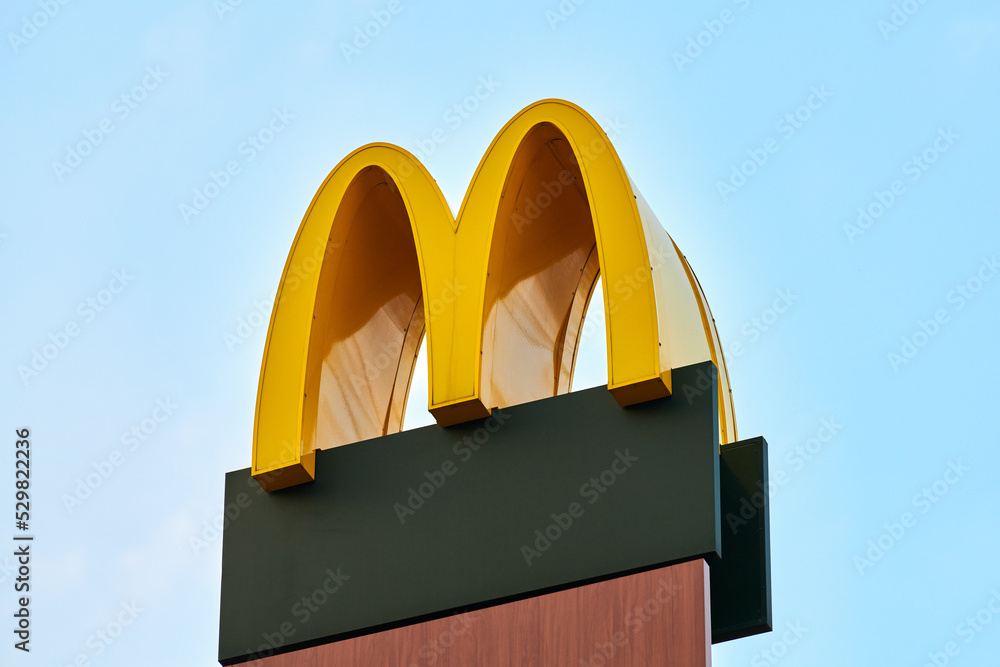 McDonalds logo roadside sign of fast food restaurant branch, yellow ...