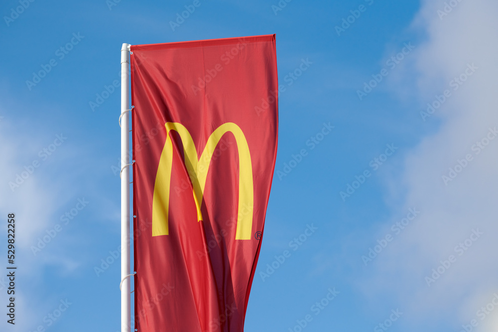 McDonalds red flag with logo of fast food restaurant branch, roadside ...