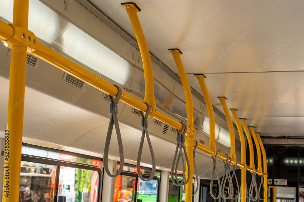Handrails inside the bus or subway for safe passage of passengers ...