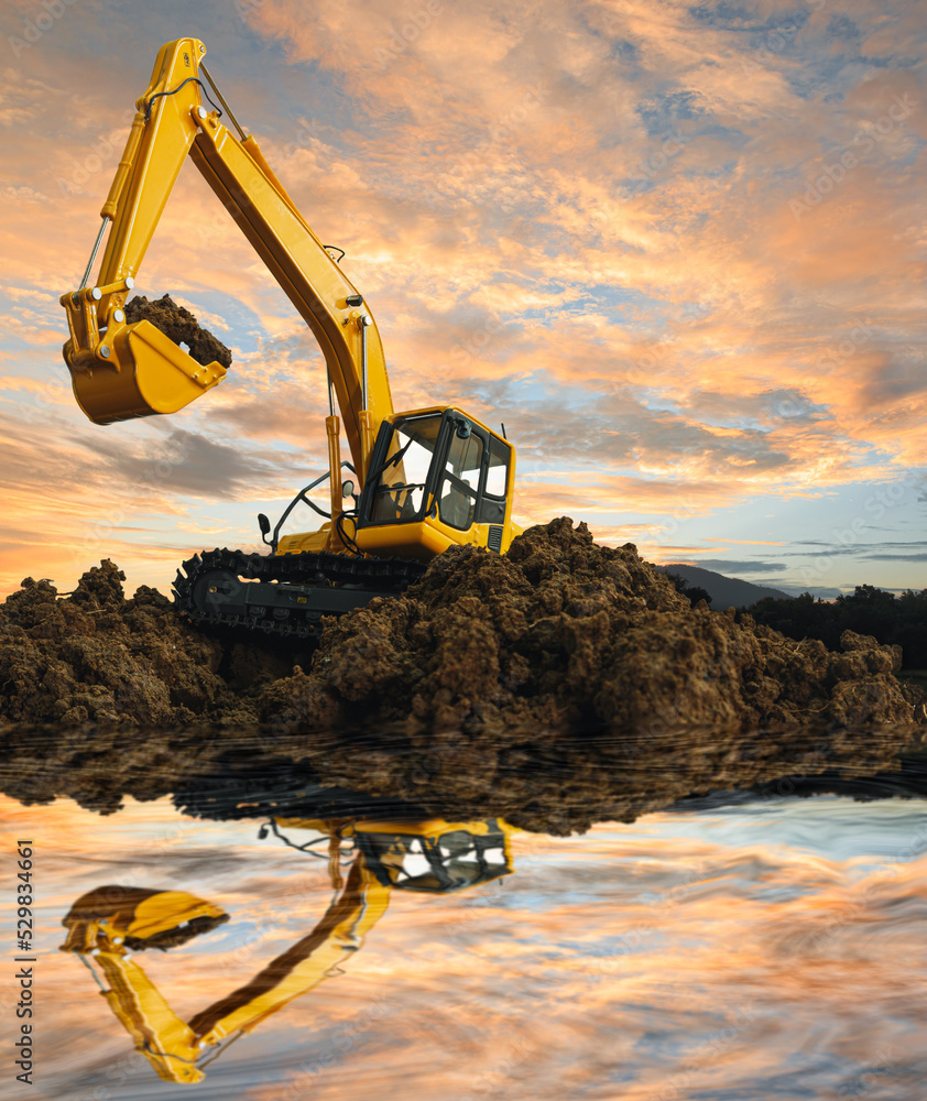 Crawler excavator is digging with lift up in the construction site ...