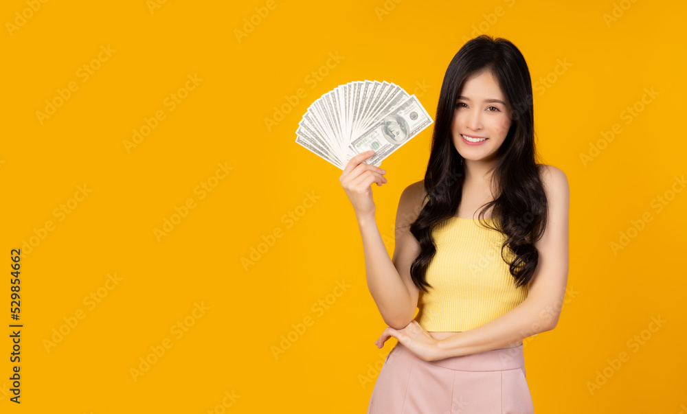 Pretty woman earn a lot of money Asian girl hold dollar, note bank or ...