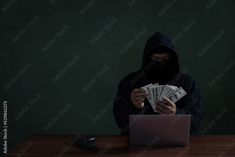 Black Hat Hacker Counting Banknote While Hacking Information From Bank ...