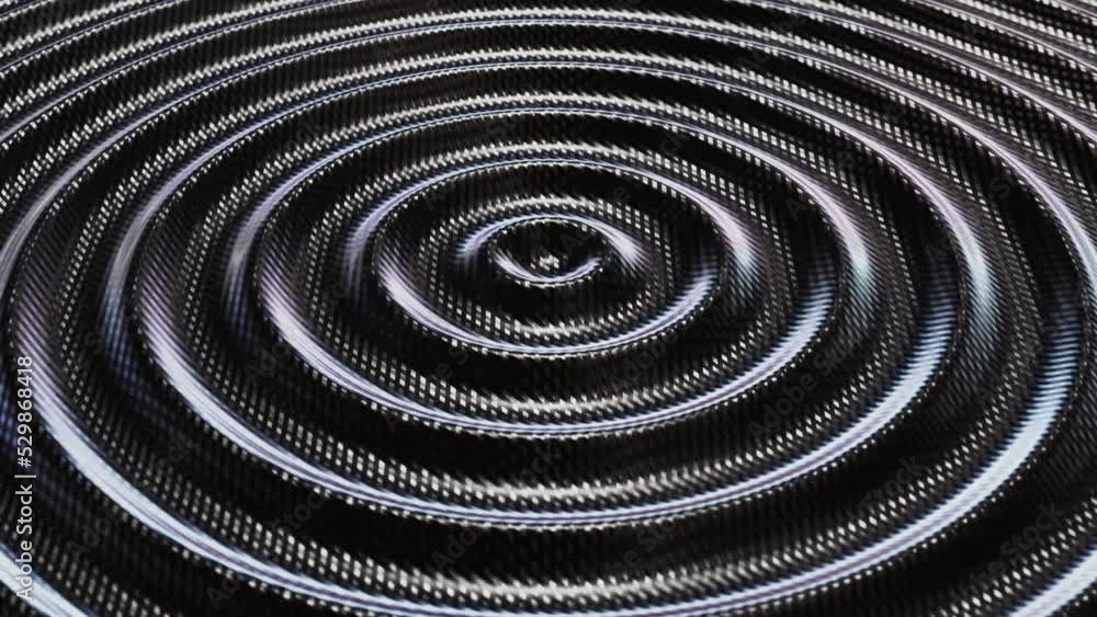 Realistic abstract looping 3D animation of the radial waving carbon ...