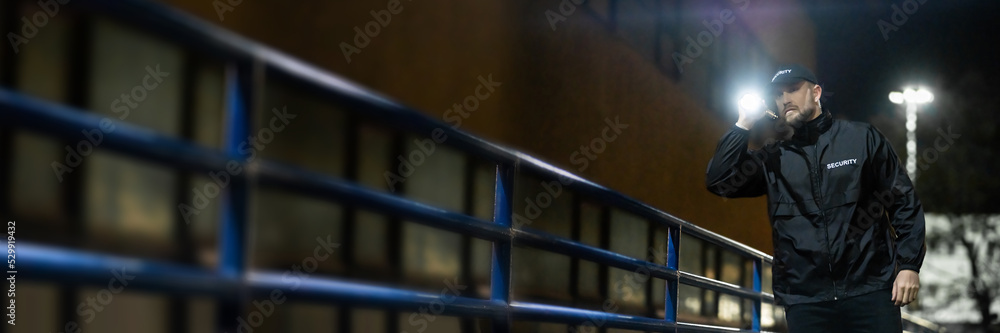 Security Guard Walking Building Perimeter Stock Photo | Adobe Stock