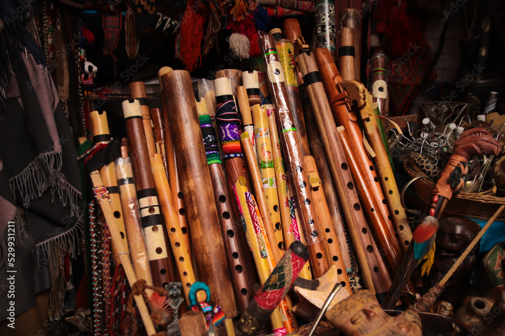 Set of Andean flutes (flauta quena) from South America on a stall in a ...