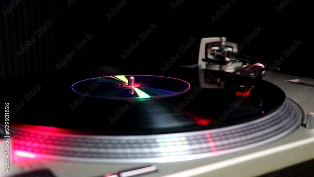 turntable needle on a vinyl record. Turntable playing vinyl. Needle on ...