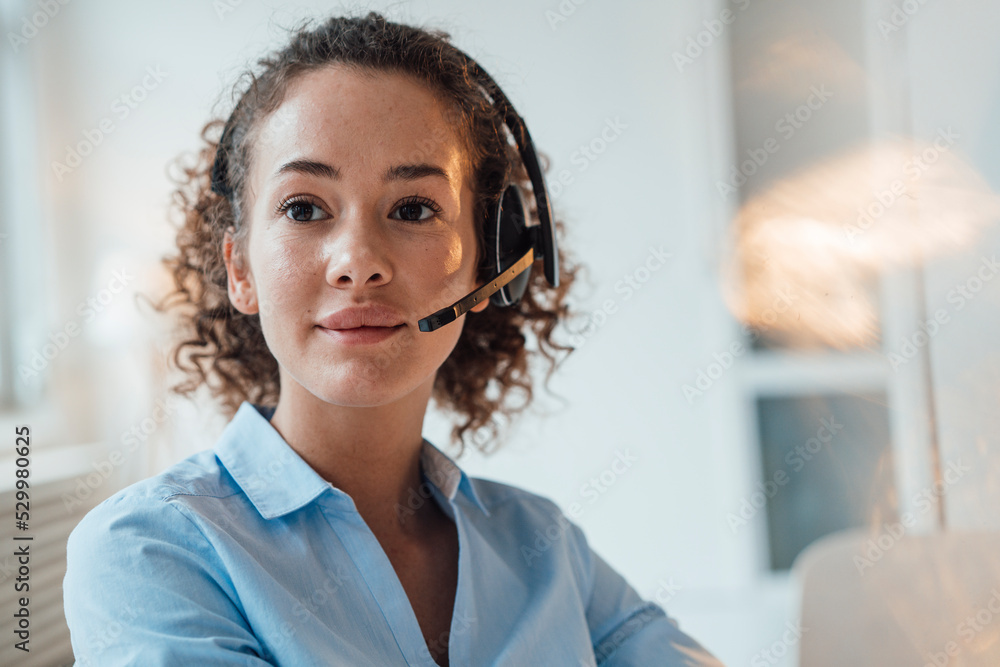 Young customer service representative wearing headset Stock Photo ...