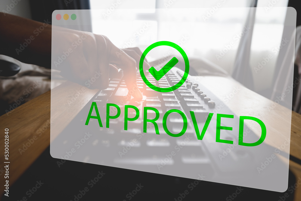 Asian woman hand tapping enter button for approving requests at home ...