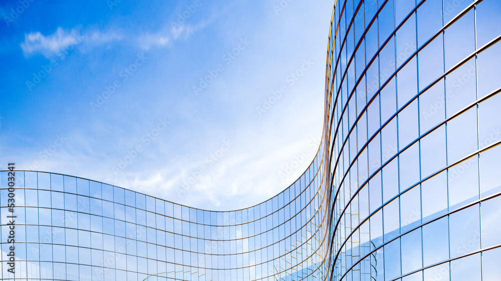 Glass buildings business concept. The glass facade of a skyscraper with ...