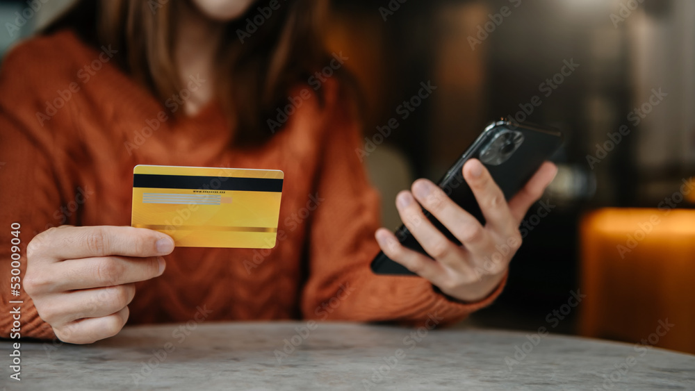 Business woman hands holding credit card with digital layer effect ...