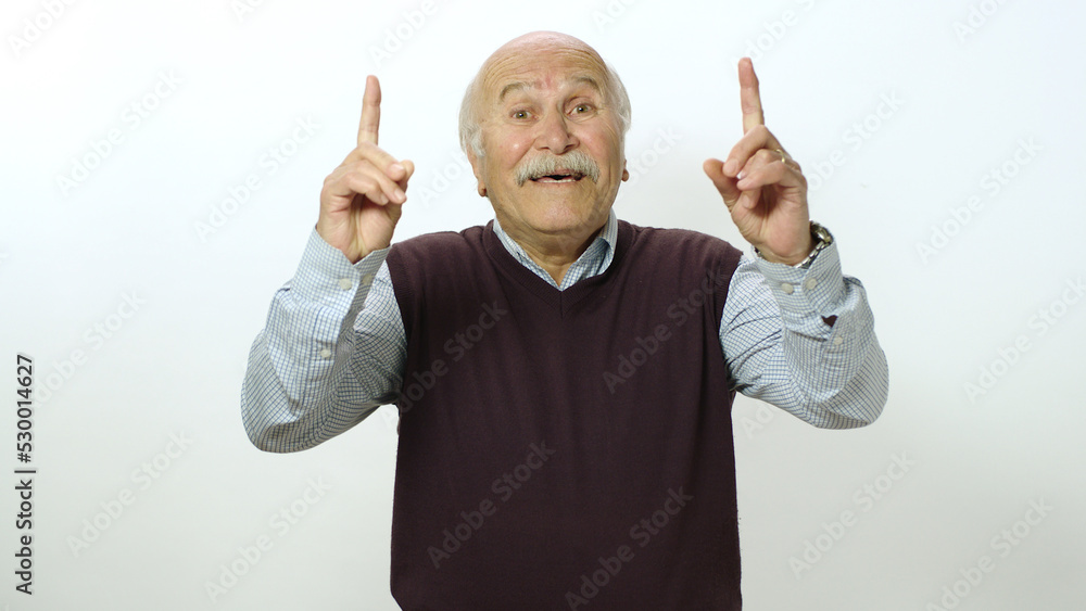 The old man points with his finger at the ad slot at the top of the ...