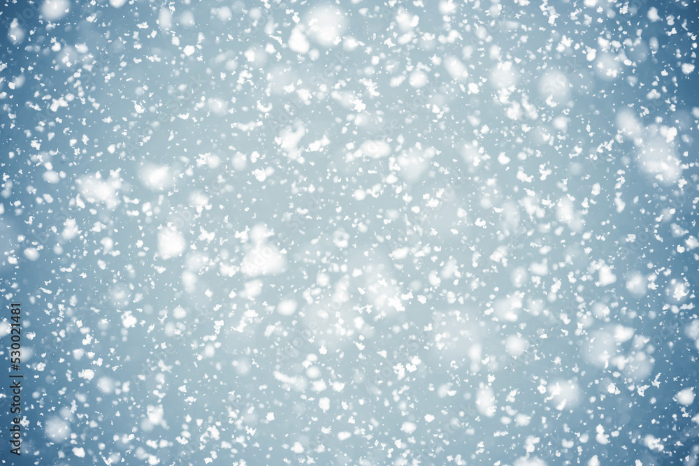 Snow falling effect from blue sky. Stock Photo | Adobe Stock
