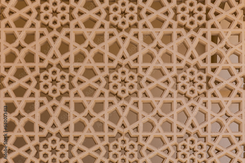 Arabic style carved stone openwork on a building facade in Old Dubai ...