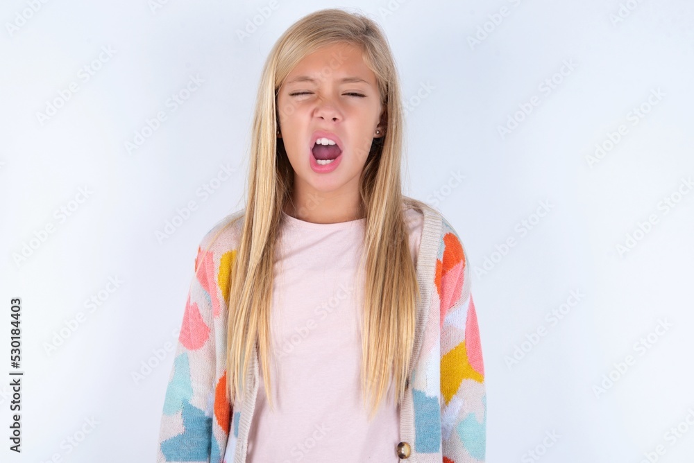 little kid girl wearing colorful yarn jacket over white background ...
