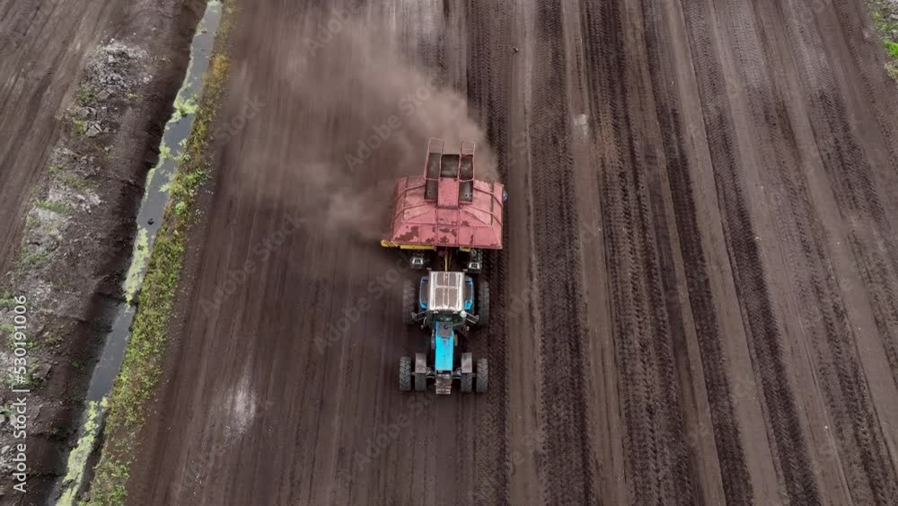 Peat Harvester Tractor on Collecting Extracting Peat. Mining and ...