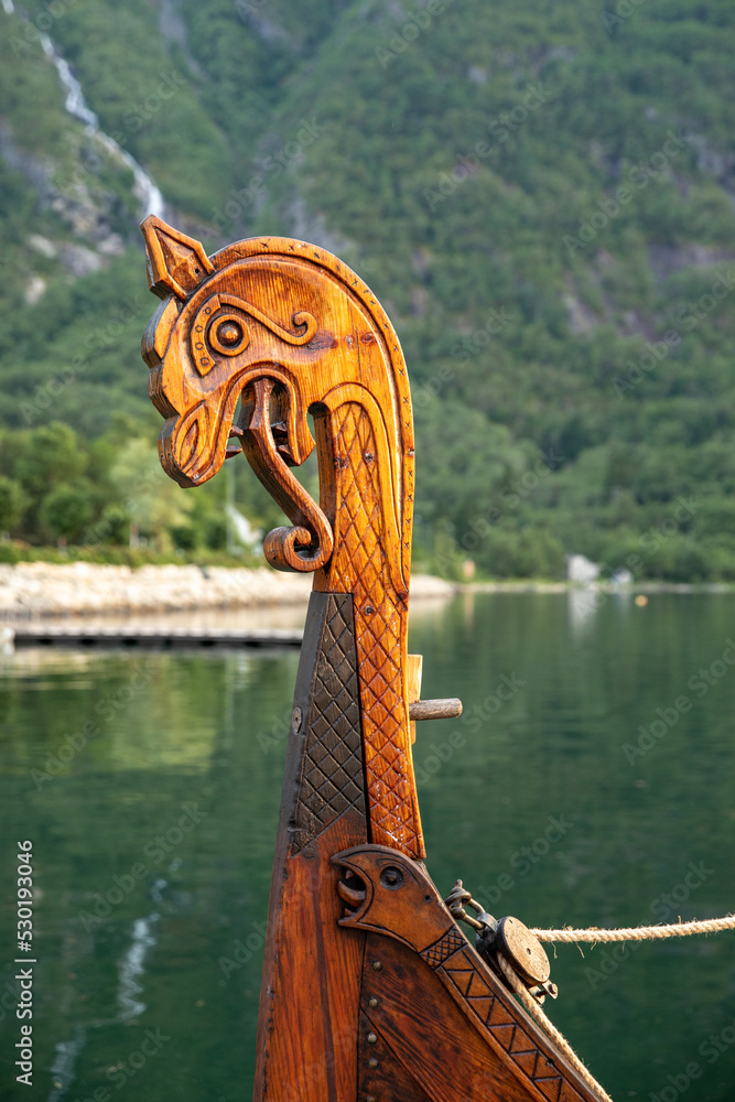 Dragon head at the front of a viking boat on the water Stock Photo ...
