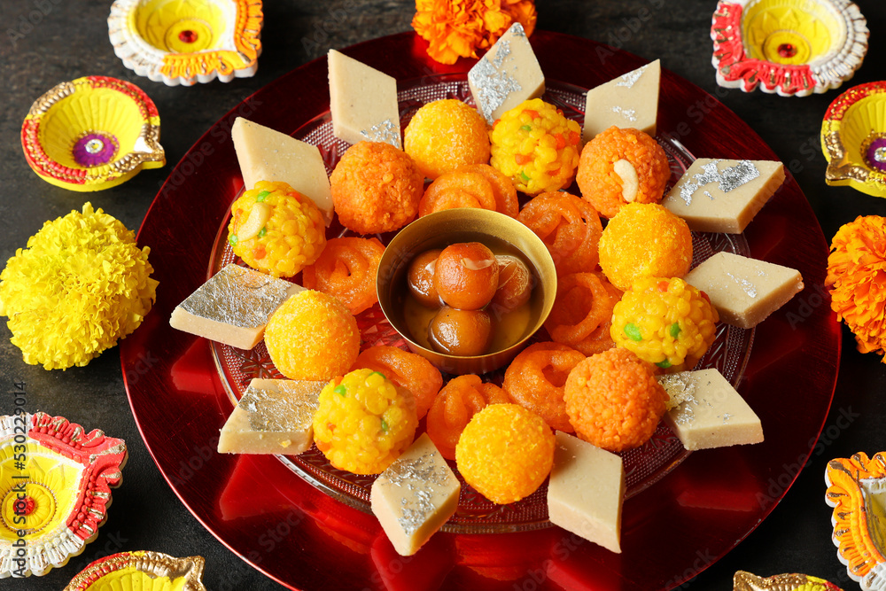 Diwali sweets Mango chum chum barfi petha Laddu Jalebi peda Indian ...